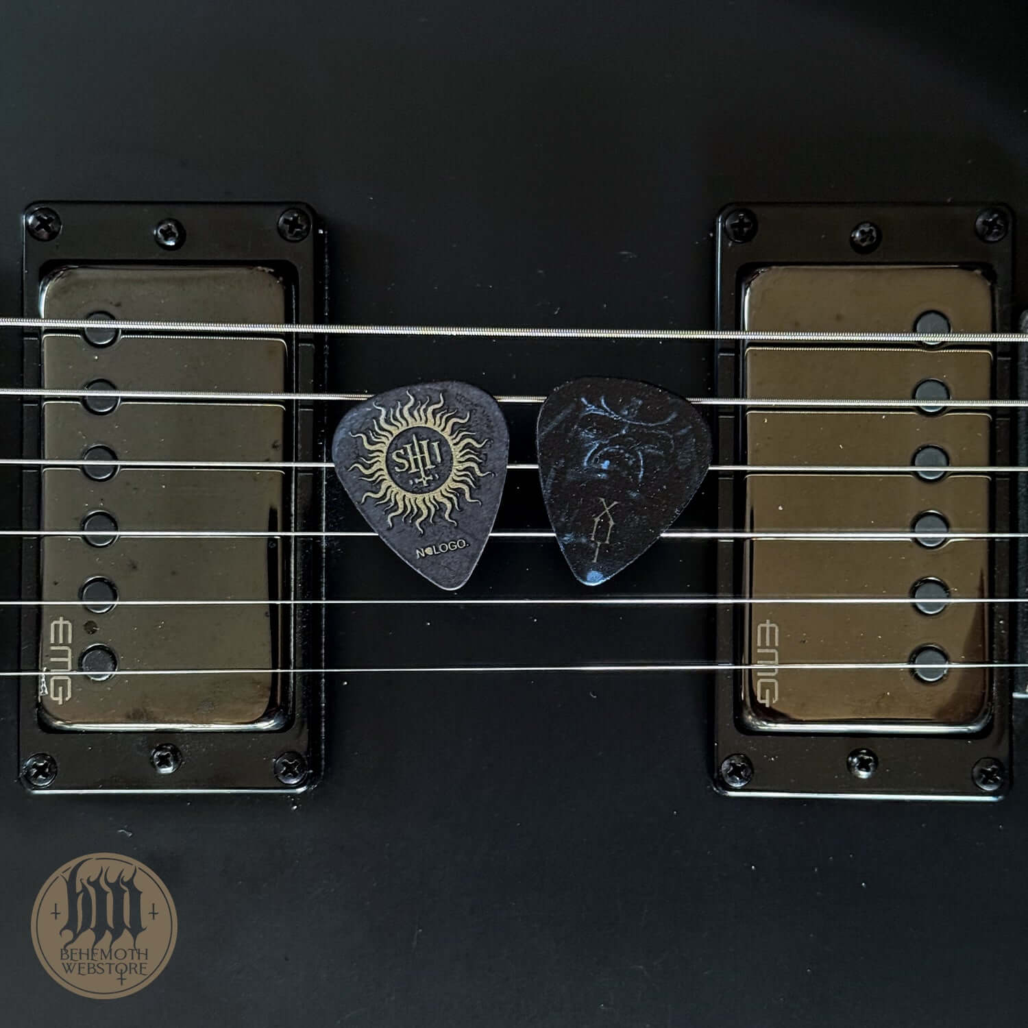 A plastic guitar pick Nergal 'TSOG Sigil'