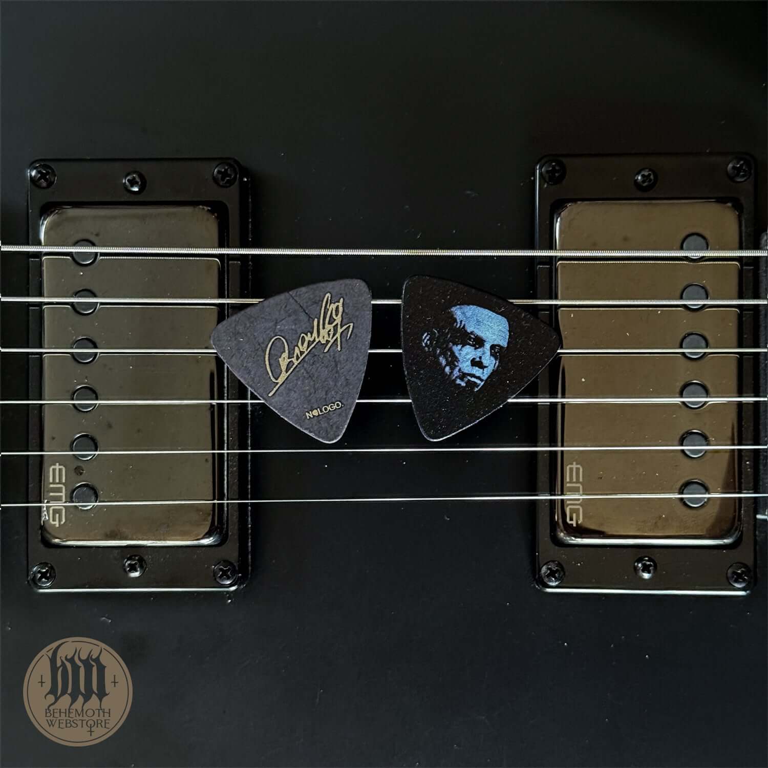 A plastic guitar pick Orion signature 'Face'